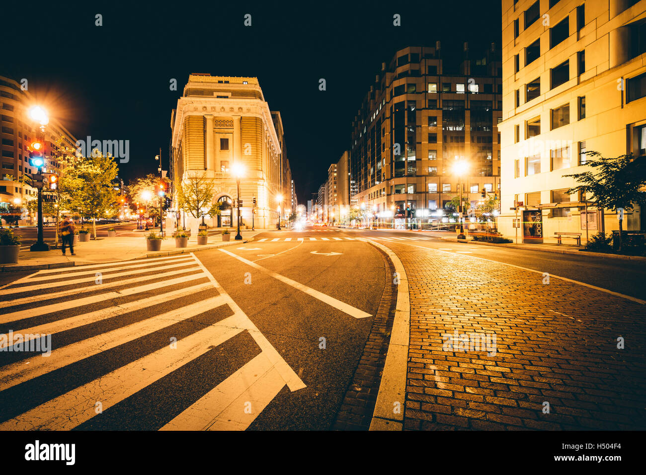 The intersection of H Street and New York Avenue at night, in ...
