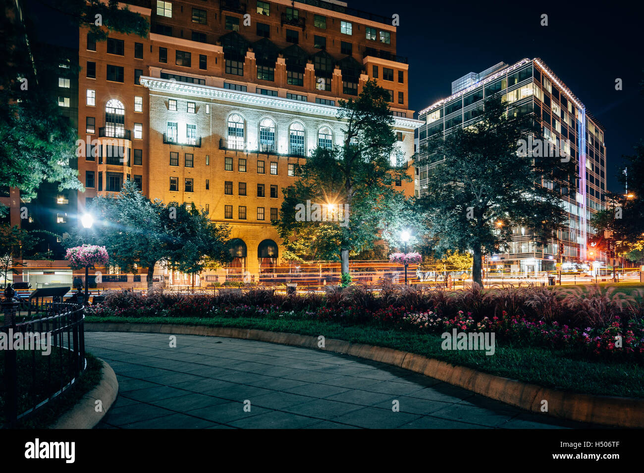 Walkway and buildings at night, at Farragut Square, in Washington, DC Stock Photo - Alamy