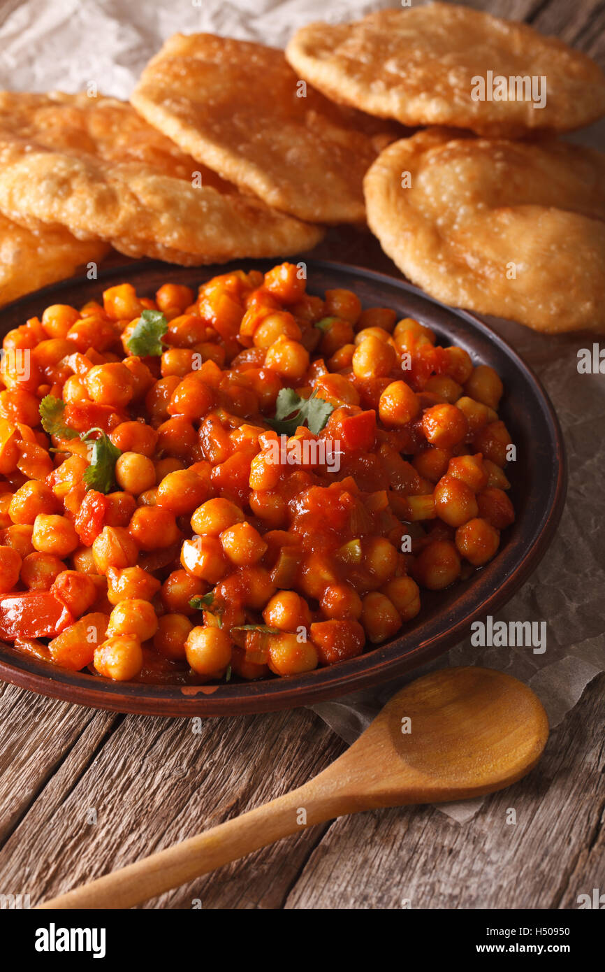 Indian Cuisine: Chana masala and puri bread close-up on the table ...