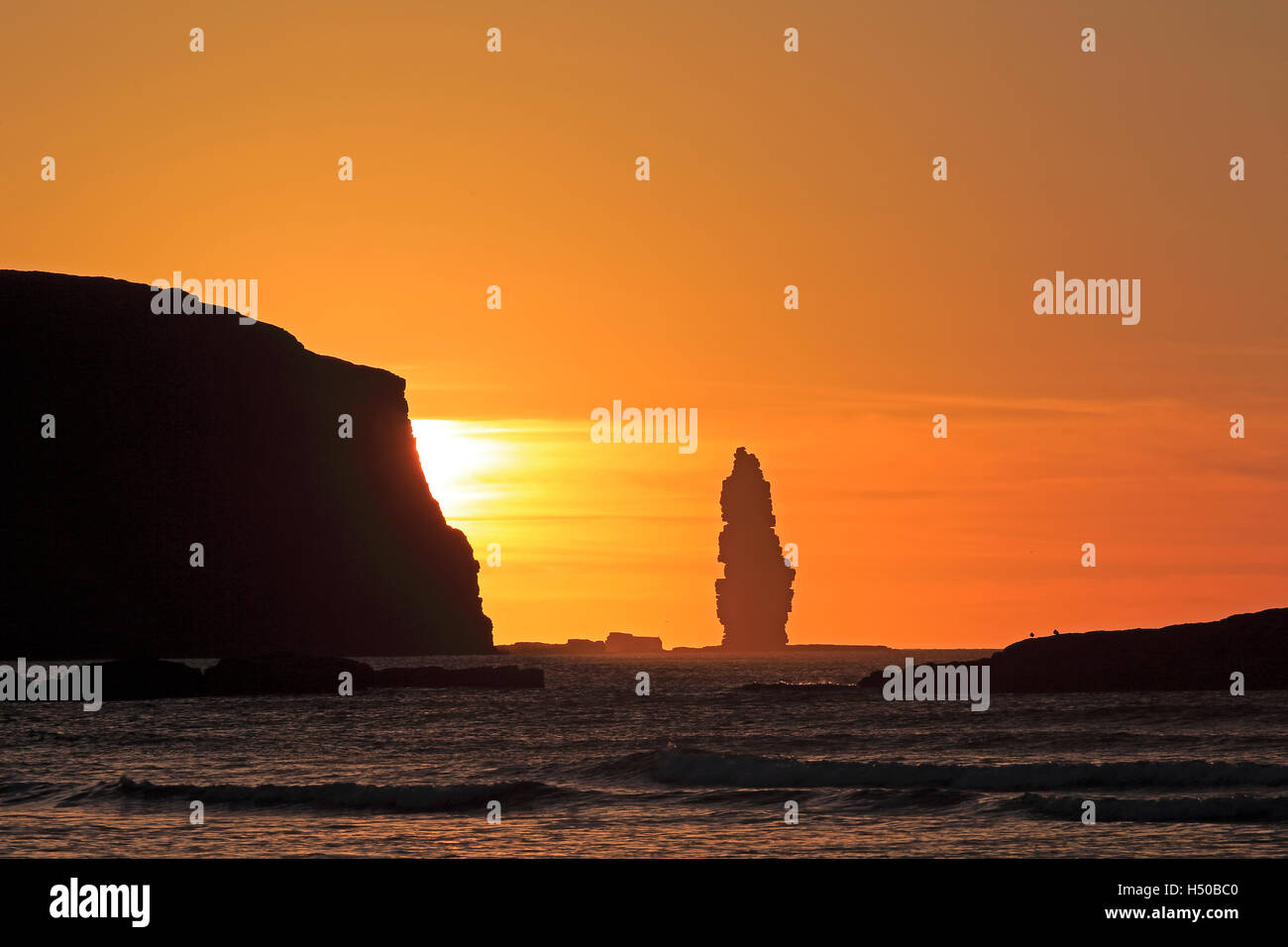 Am Buachaille sea stack at sunset from Sandwood Bay Sutherland Scotland ...