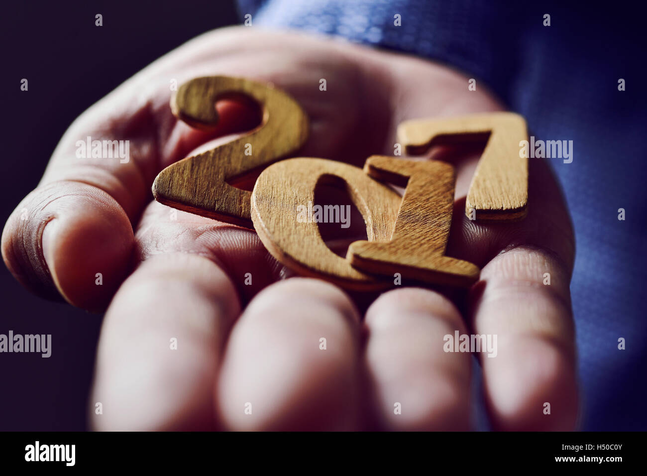closeup of wooden numbers forming the number 2017, as the new year, in ...