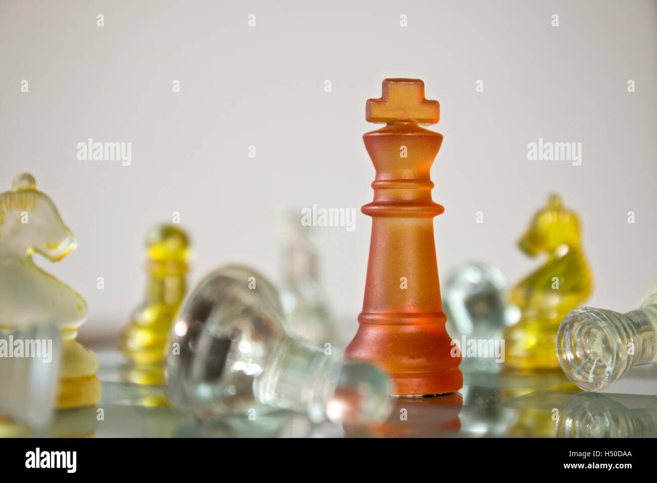 Crystal Glass color Chess piece on a chess board Stock Photo - Alamy