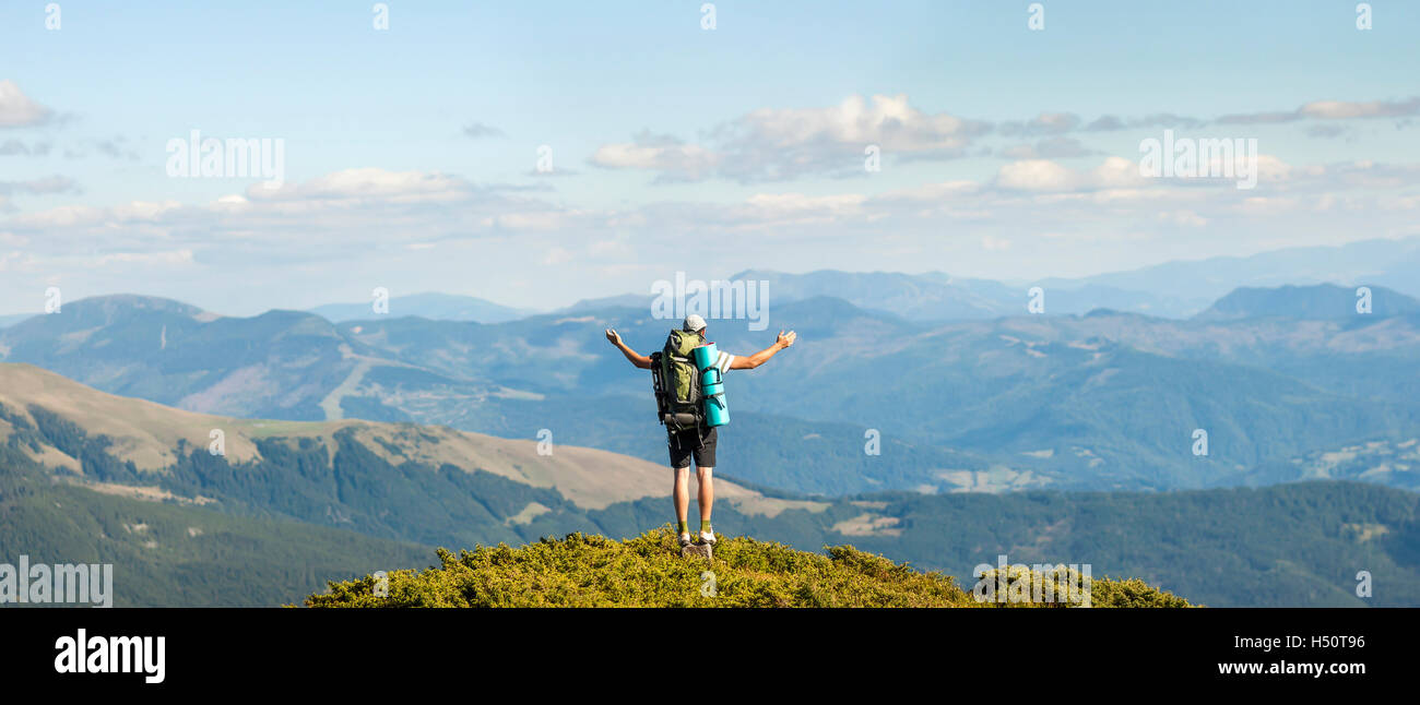 Hiker standing on top of mountain. Unity with nature concept Stock ...