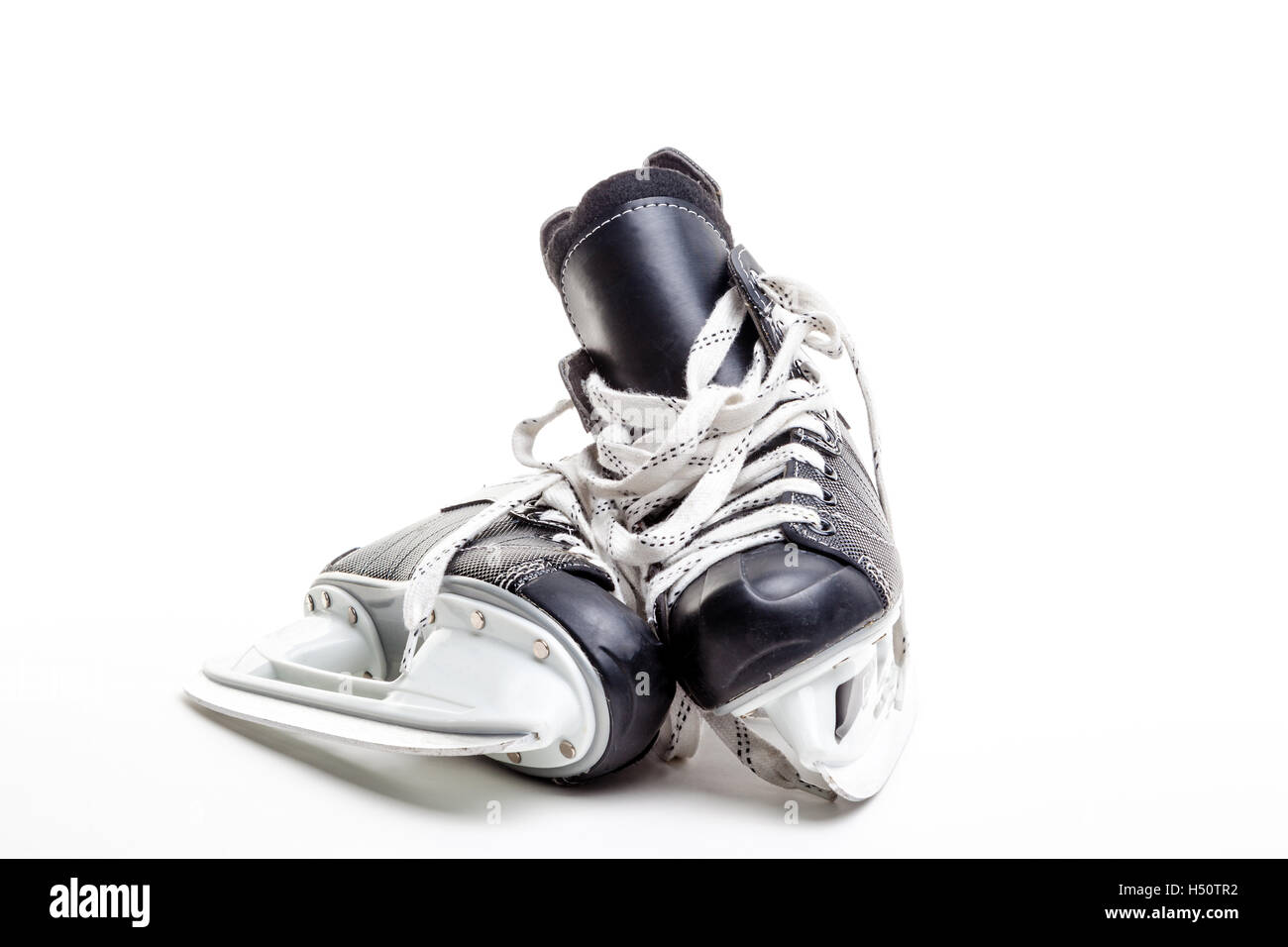 A pair of ice hockey skates isolated on white background with copy ...