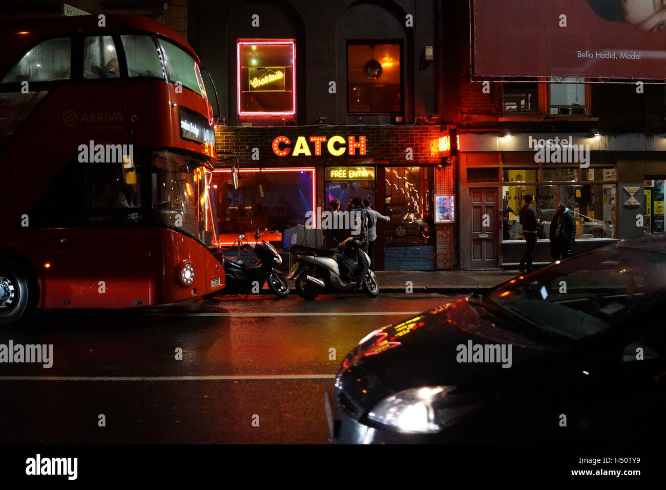 Cocktail bar, night bus and people at Shoreditch, London Stock Photo ...