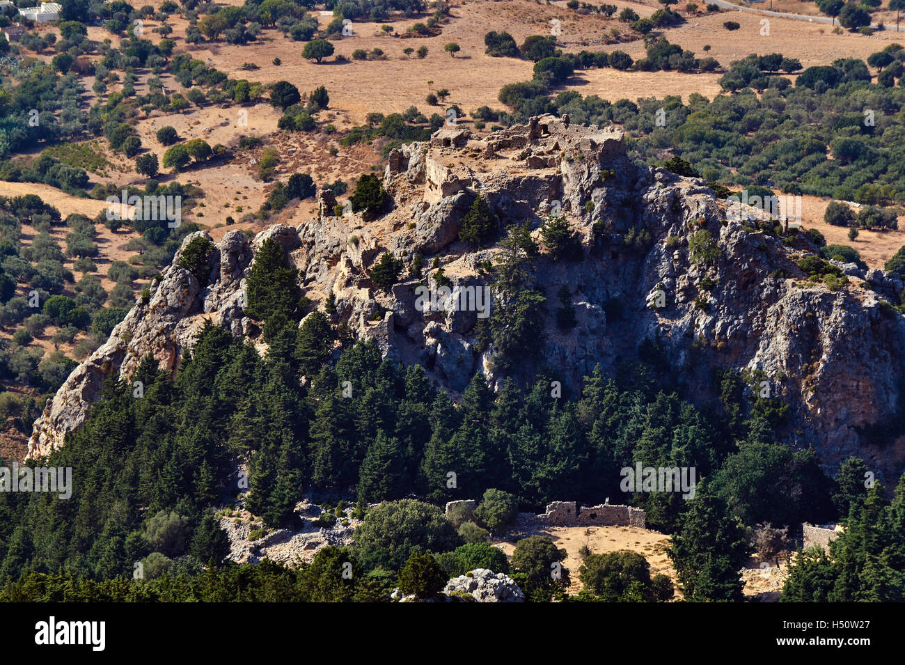The stone ruins of a medieval castle atop a hill on the island of Kos ...