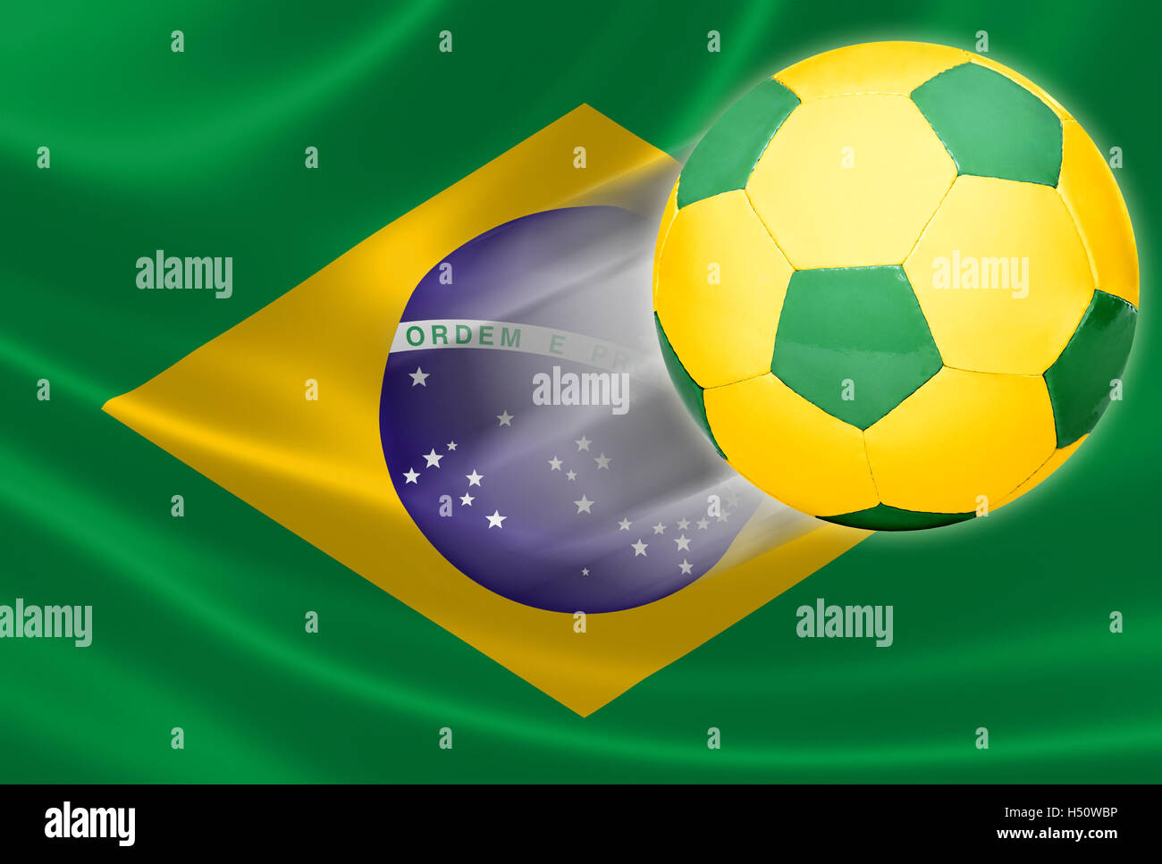 Soccer ball flying out of the Brazilian flag in anticipation of 2014 ...