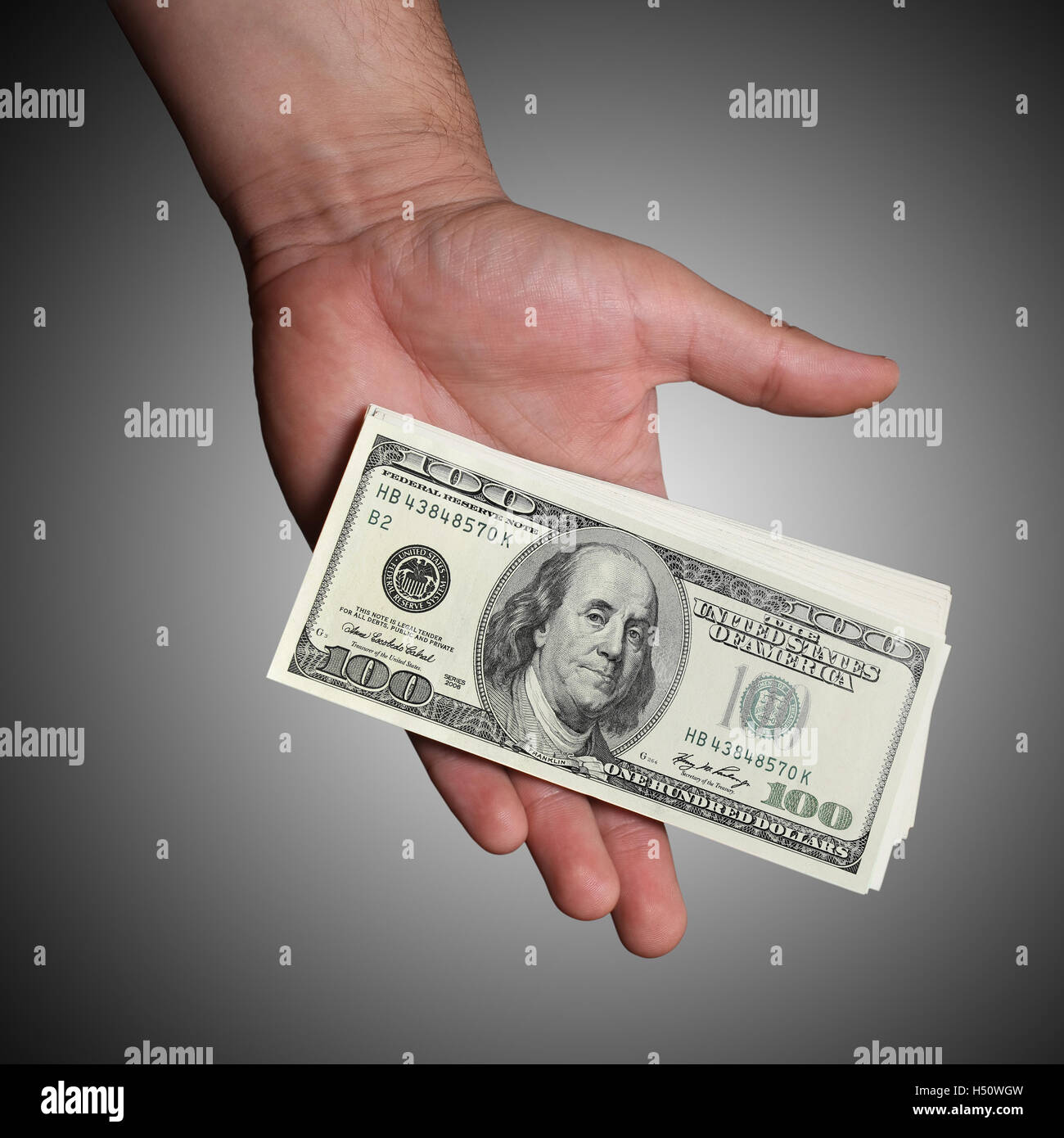 Money in hand Stock Photo - Alamy