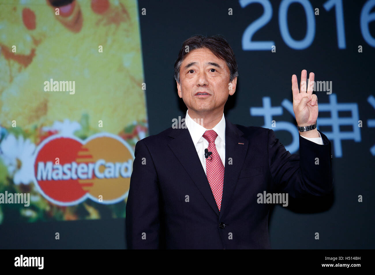 NTT DoCoMo President Kazuhiro Yoshizawa speaks during a press ...