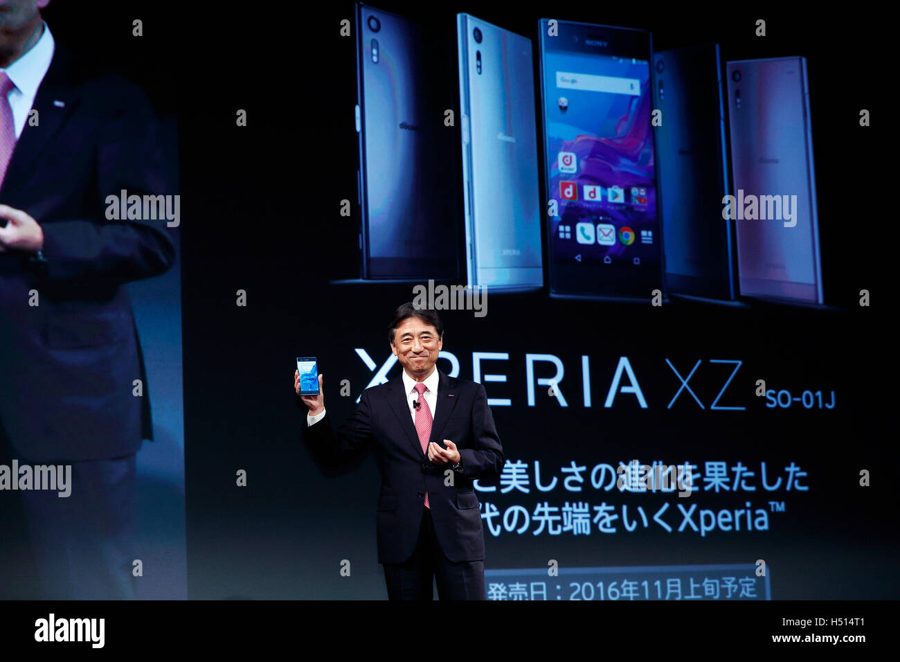 NTT DoCoMo President Kazuhiro Yoshizawa speaks during a press ...