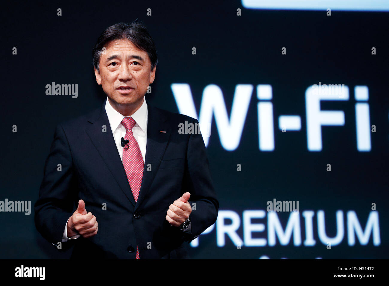 NTT DoCoMo President Kazuhiro Yoshizawa speaks during a press ...