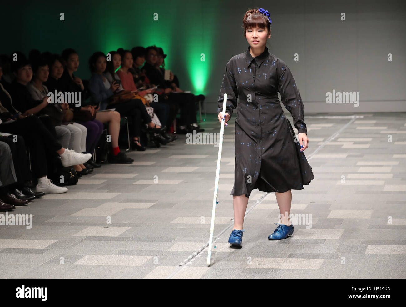 Tokyo, Japan. 19th Oct, 2016. A blind model Masami Matsuda displays ...