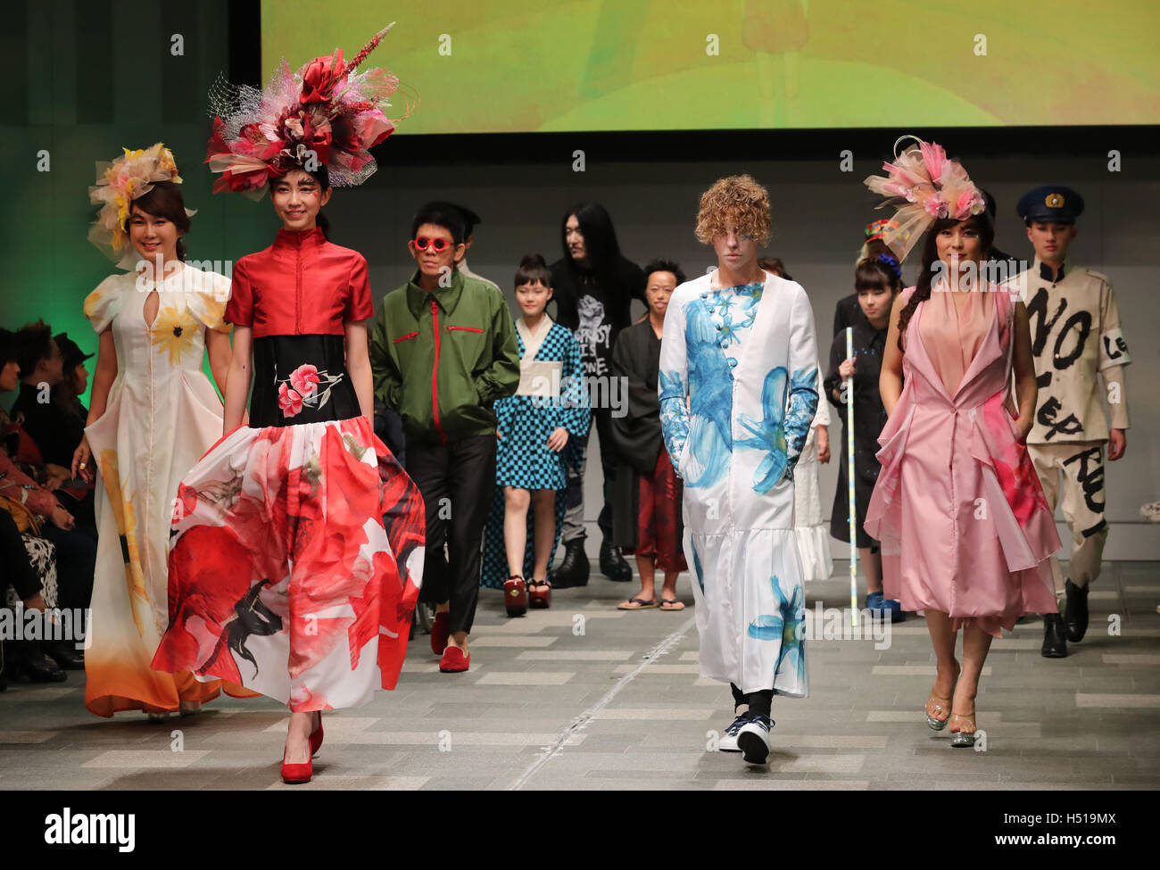 Tokyo, Japan. 19th Oct, 2016. Models display creations of Japanese ...