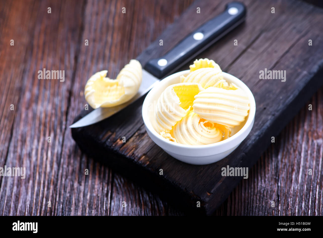 butter on plate and on a table Stock Photo - Alamy