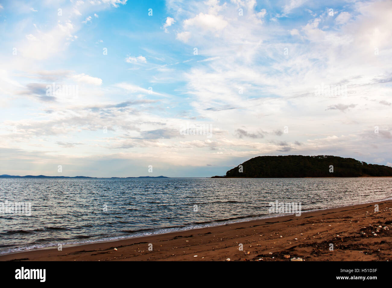 Dramatic colorful sunset on the beach of the Japanese sea, real scene ...