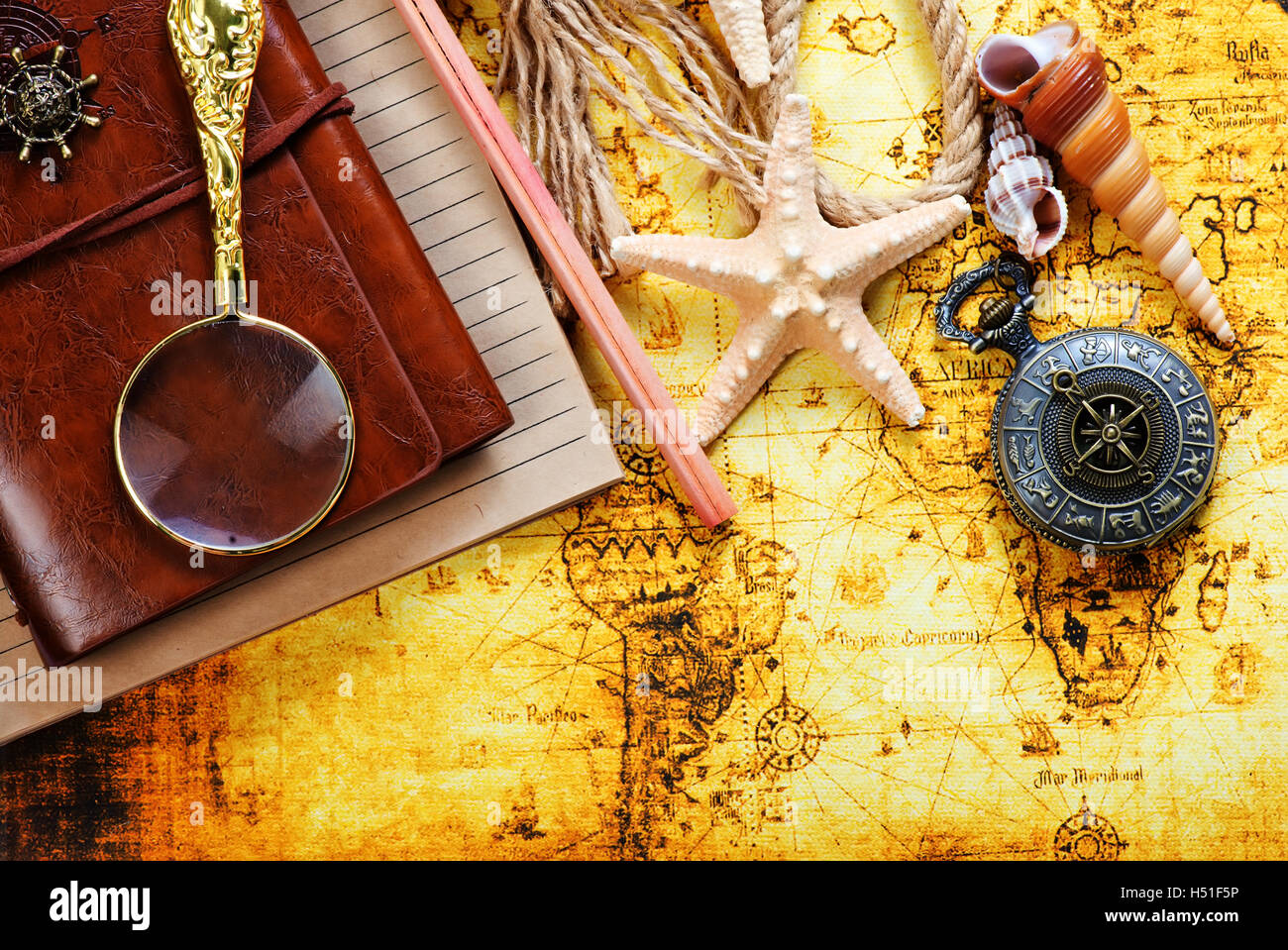 Marine still life spyglass and world map on wooden background Stock ...