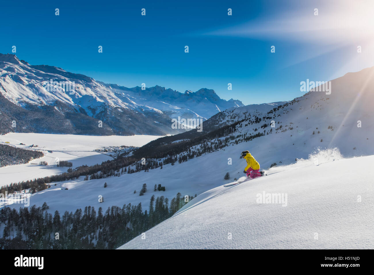 girl in off-piste skiing Stock Photo - Alamy