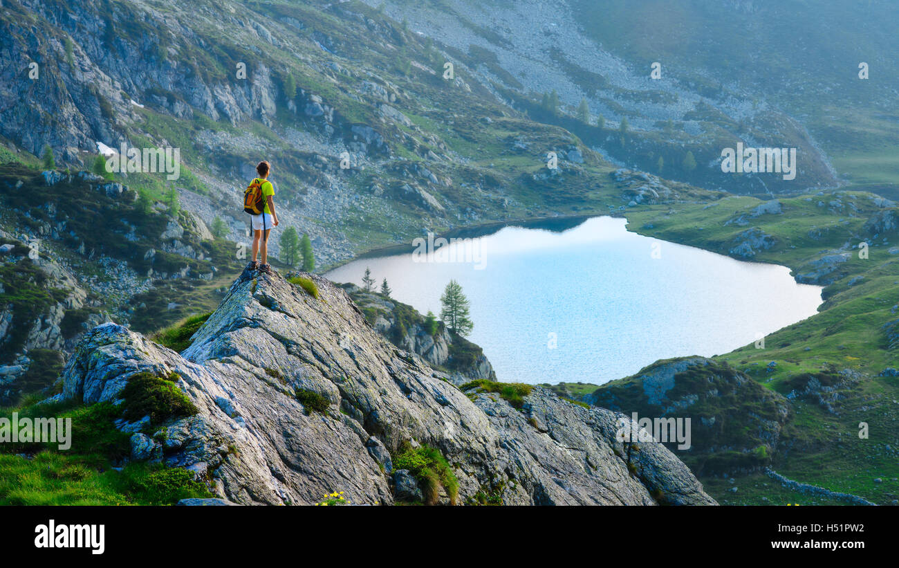 Girl looks mountain lake hi-res stock photography and images - Alamy