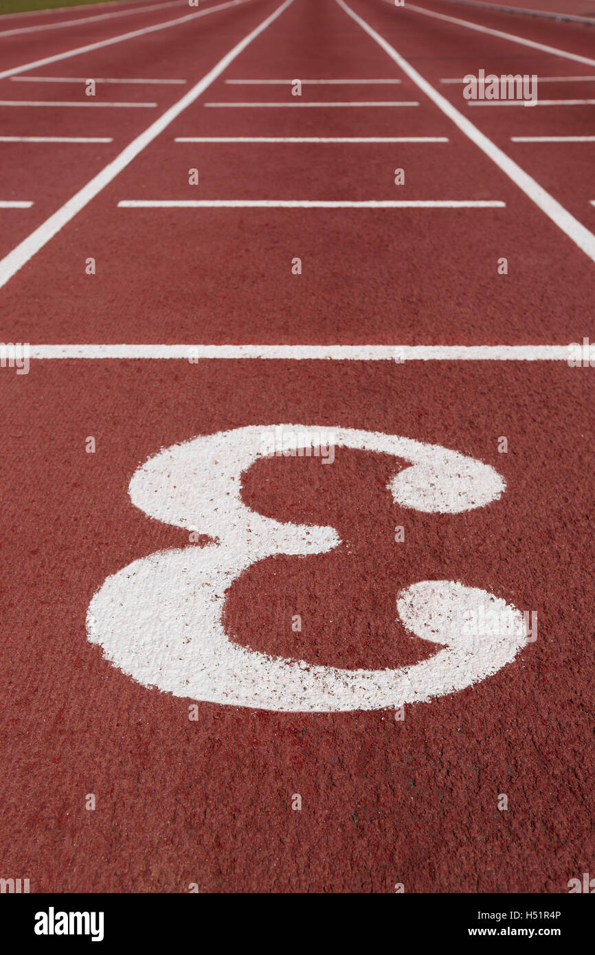 Number three signpost in an athletic running track. Vertical Stock ...