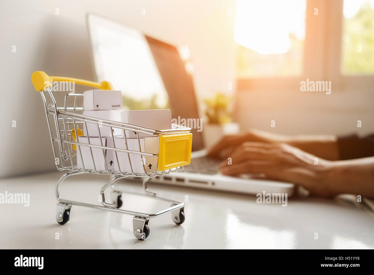 Internet online shopping concept with laptop and shopping-cart.Vintage ...