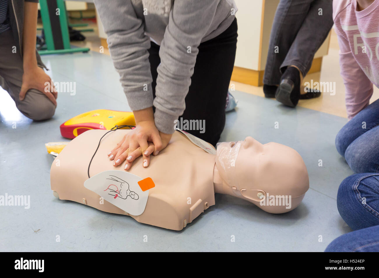 First aid resuscitation course using AED Stock Photo - Alamy