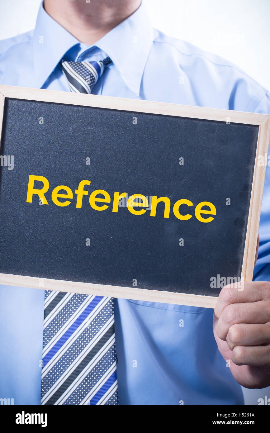 Businessman holding a Blank chalkboard with text reference Stock Photo ... Businessman holding a Blank chalkboard with text reference Stock Photo ...