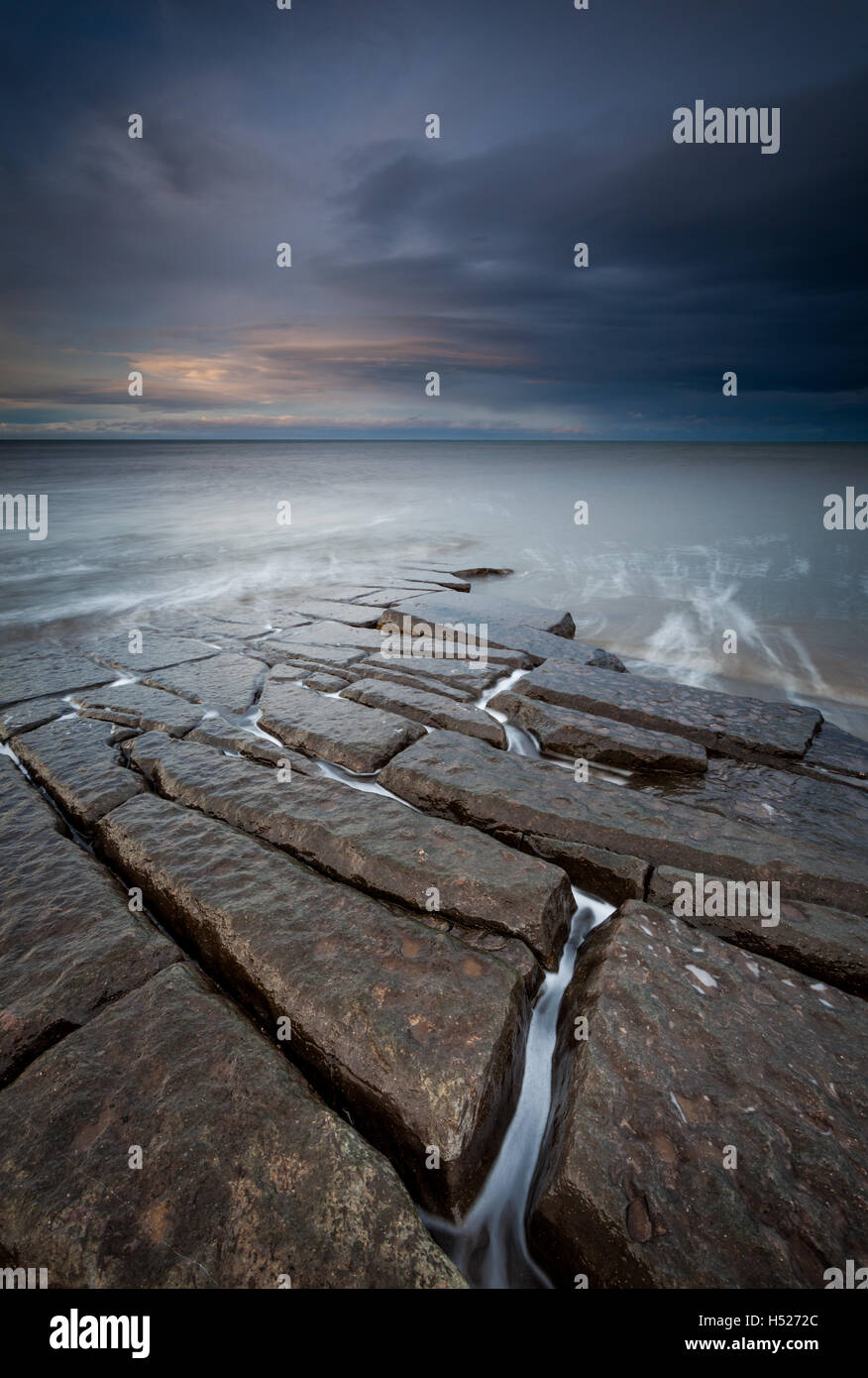 Jigsaw puzzle like slabs of angular rocks leading out into the North ...