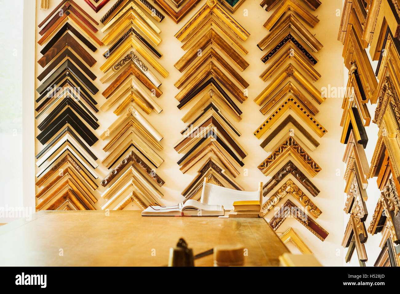 Interior view of a picture framers workshop, a large selection of frame ...