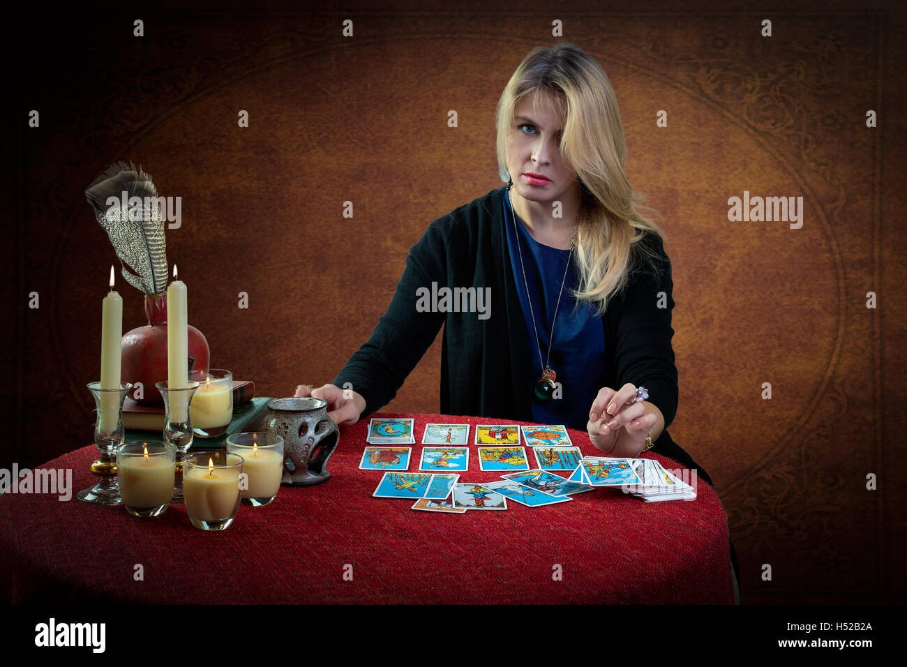 Woman with tarot cards Stock Photo - Alamy