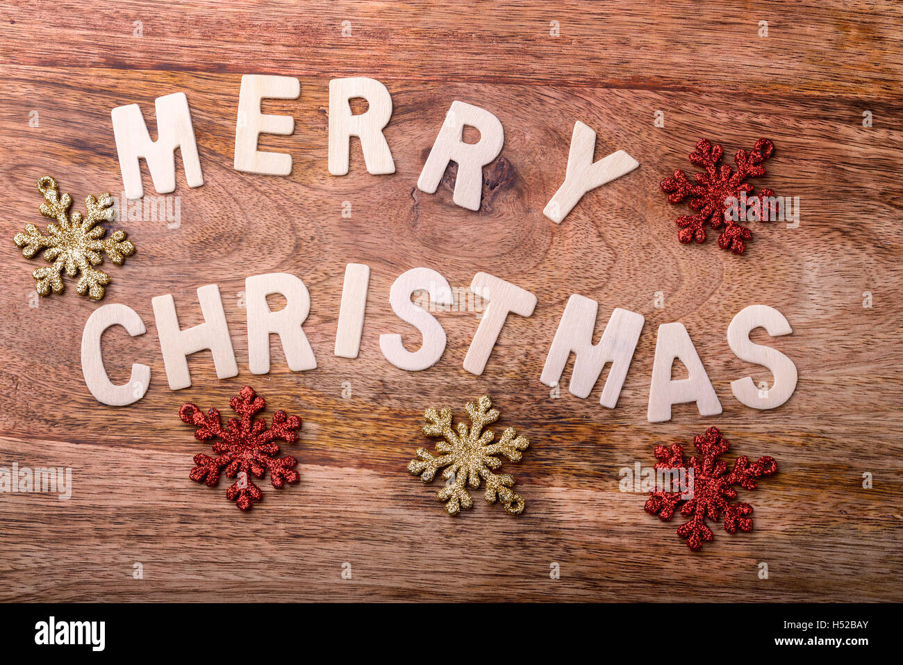 Merry christmas wooden letters hi-res stock photography and images - Alamy