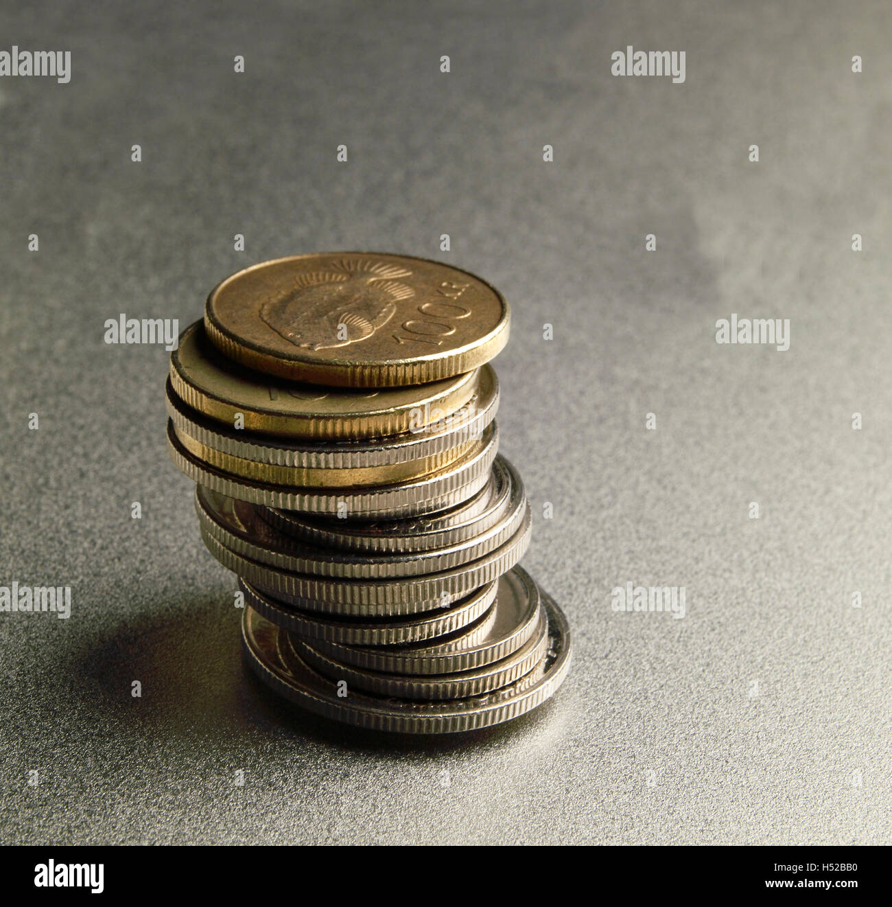 Icelandic 100 Kronur coins stacked Stock Photo - Alamy