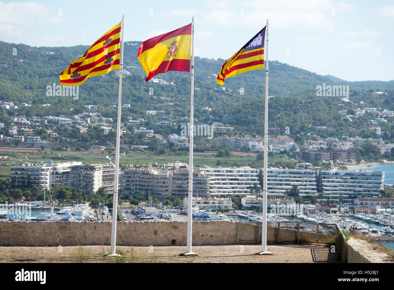 Flags over Ibiza Town, is a city and municipality located on the ...
