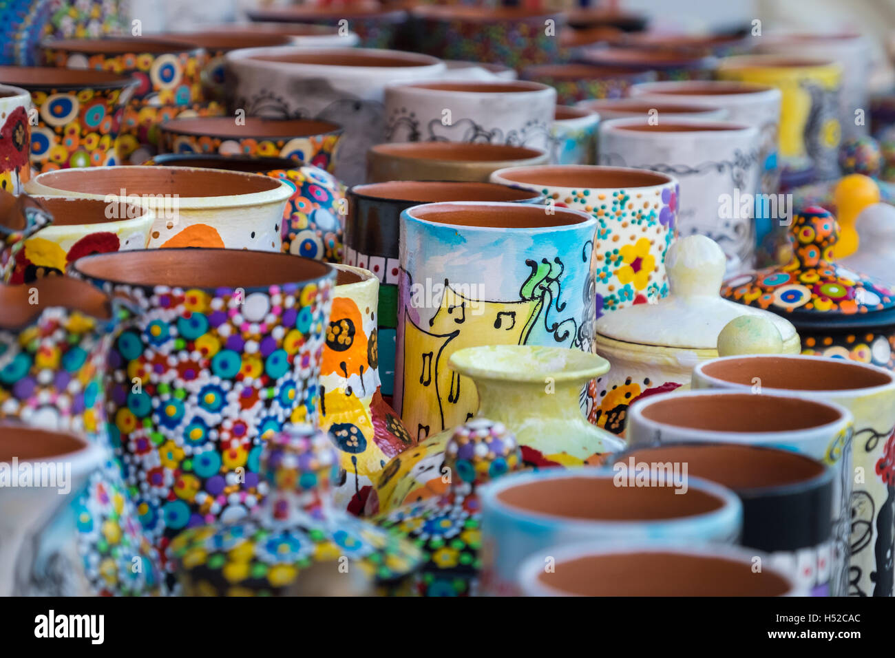 Colorful ceramic pottery on display to be sold Stock Photo - Alamy
