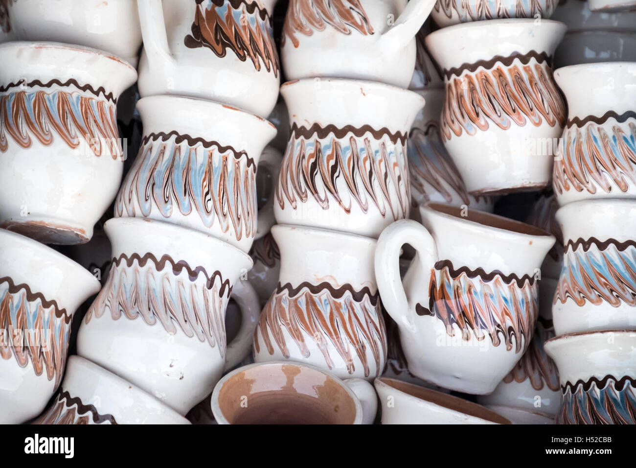 Colorful ceramic pottery on display to be sold Stock Photo - Alamy