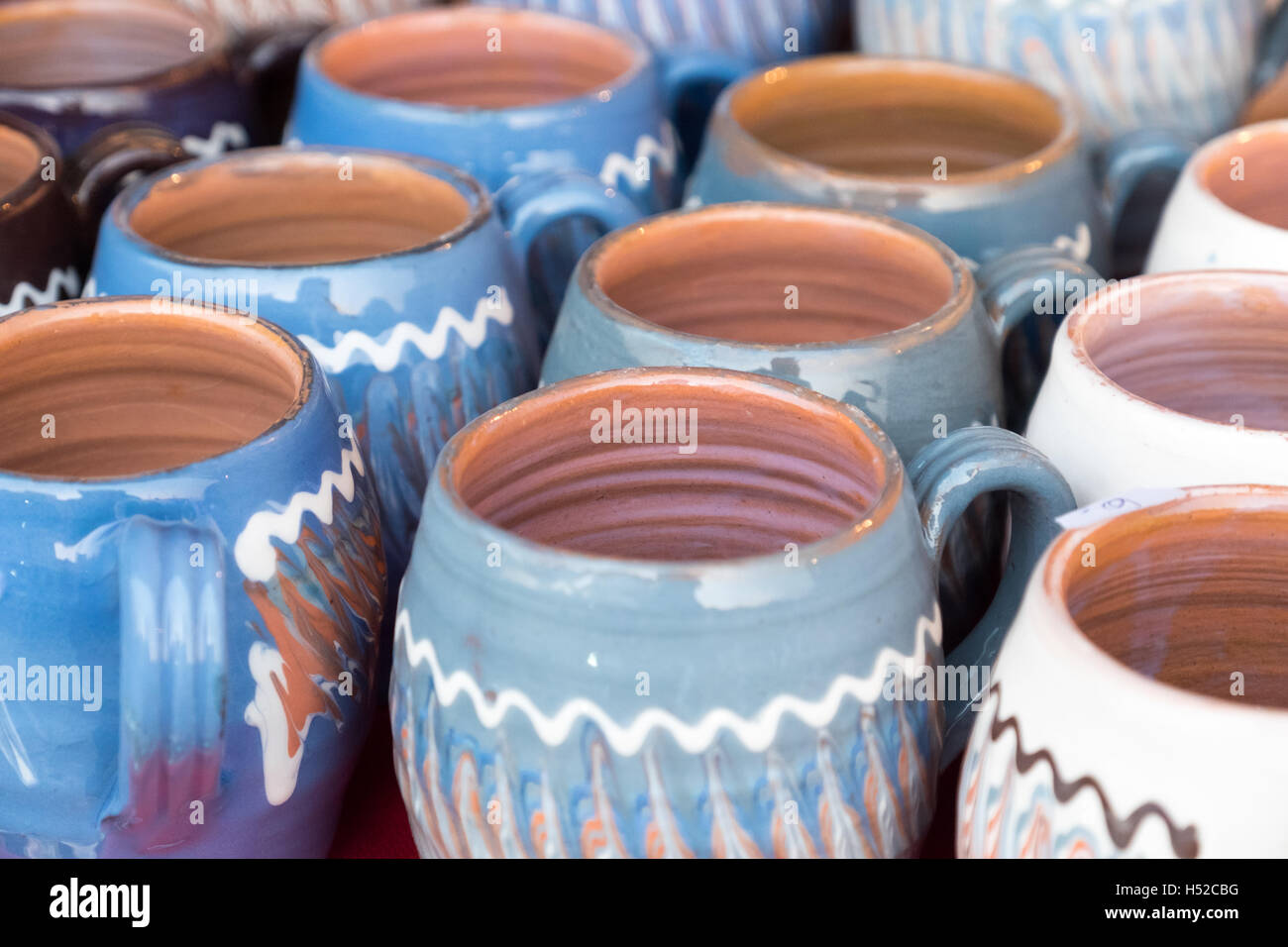 Colorful ceramic pottery on display to be sold Stock Photo - Alamy