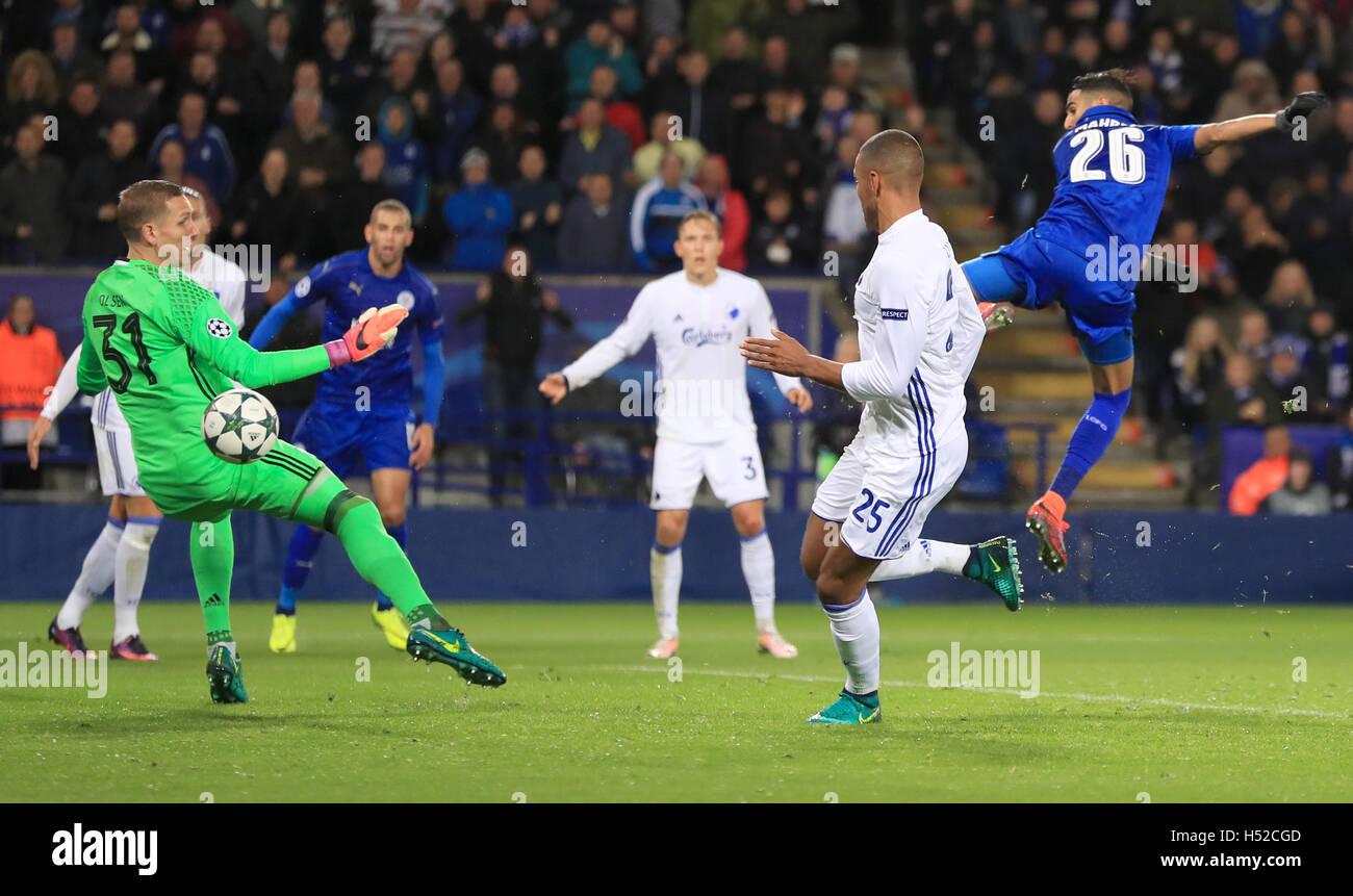 Leicester City's Riyad Mahrez (right) takes a shot on goal during the ...