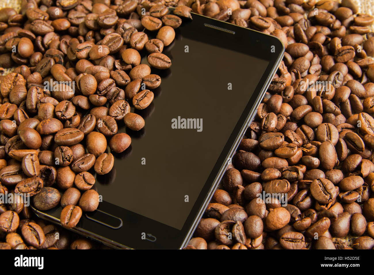 mobile phone in the coffee Stock Photo - Alamy