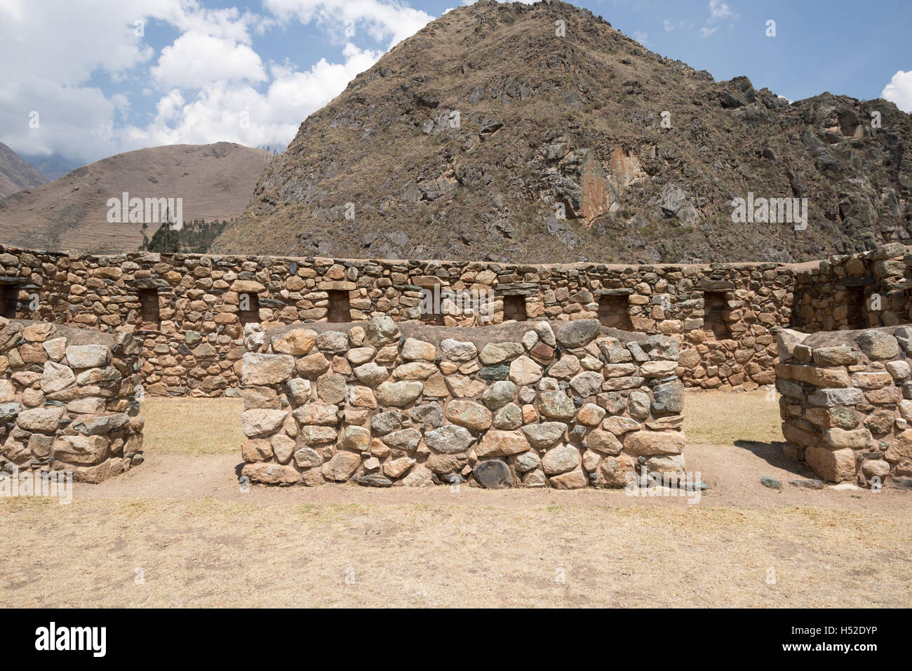Stone walls and niches of the Huillca Raccay Inca ruins along the Inca ...
