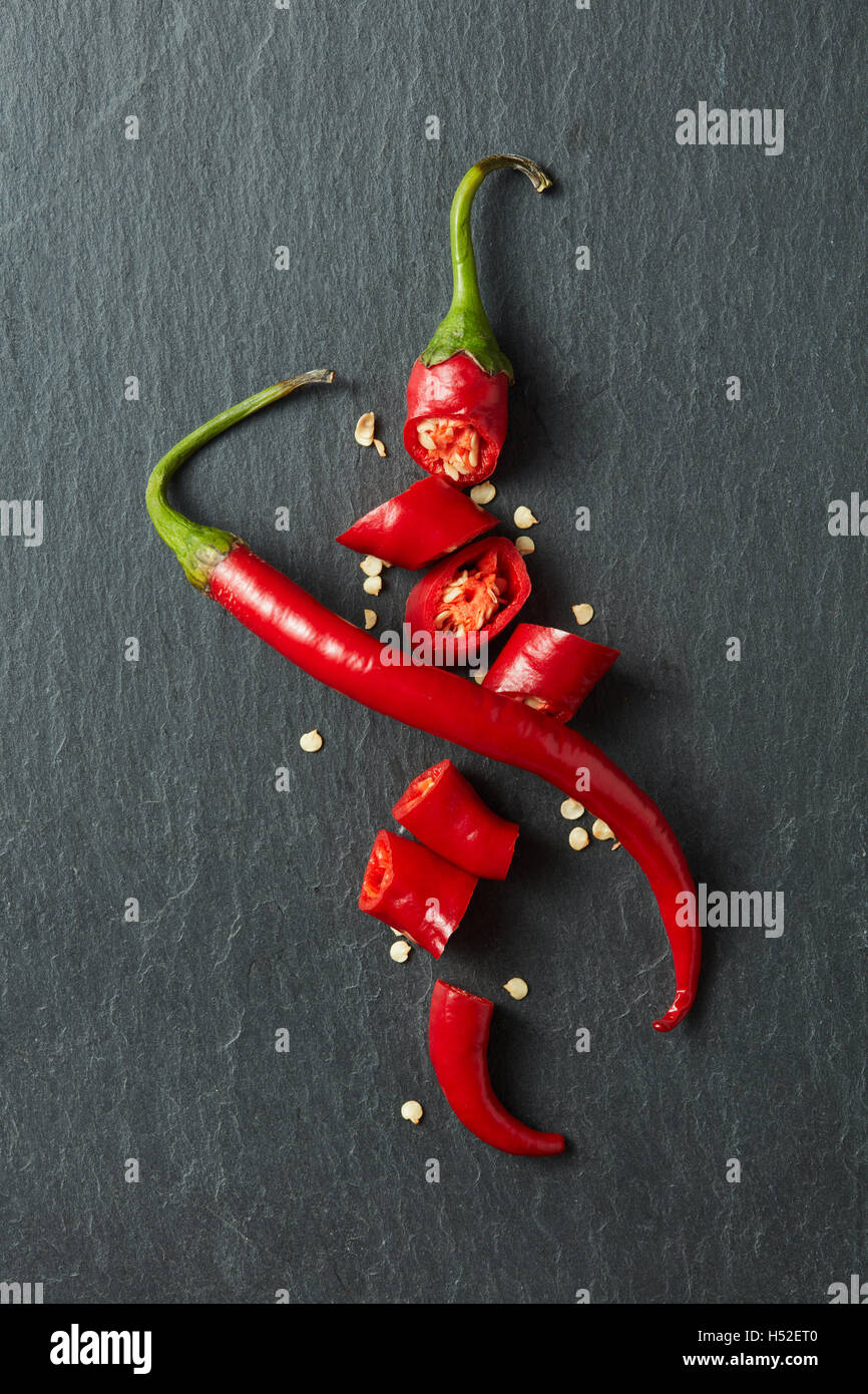 Red chili pepper cut into slices Stock Photo - Alamy