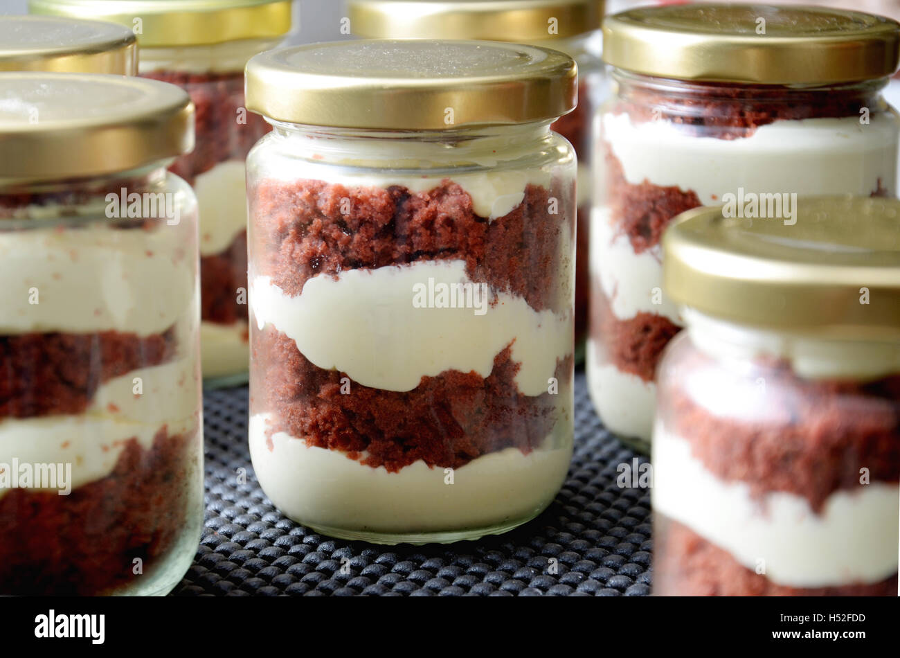 several red velvet cake in a jar Stock Photo - Alamy