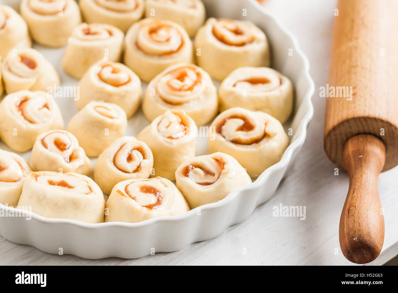 Rolling pin rolls dough close hi-res stock photography and images - Alamy