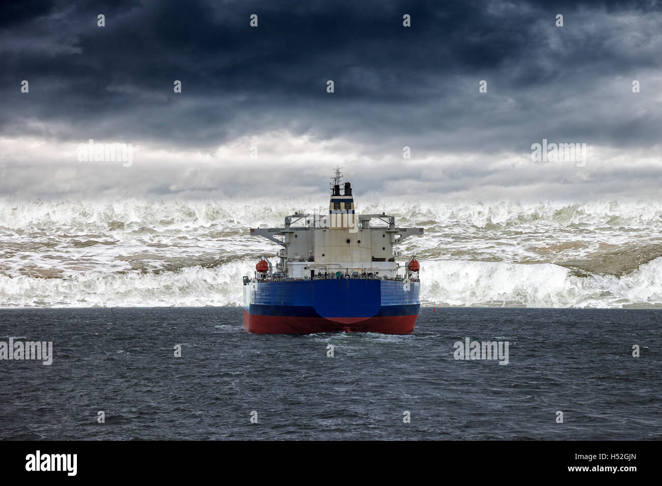 Big ship at sea during by a tsunami Stock Photo - Alamy