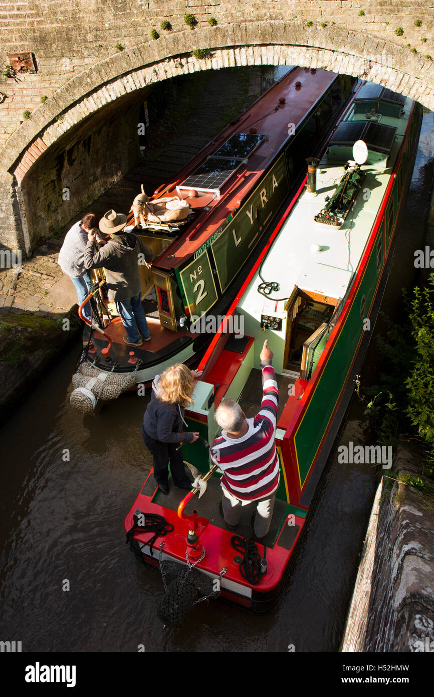 UK, England, Cheshire, Bunbury, Tilston Locks, narrowboats passing side ...