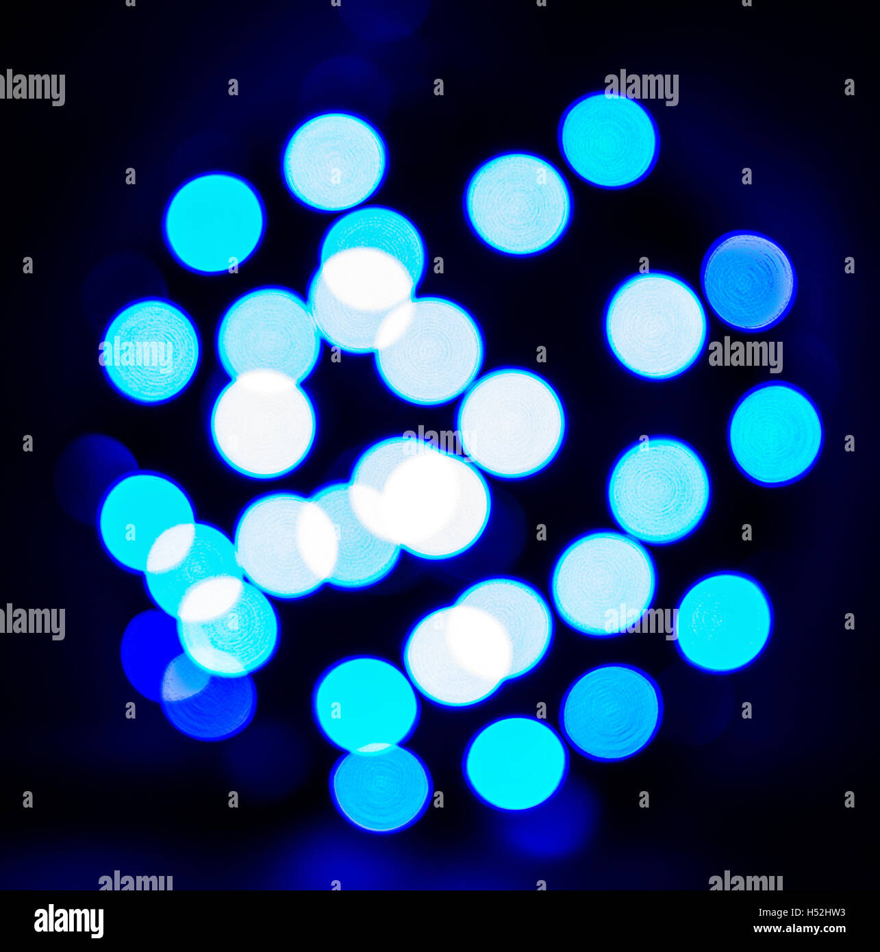 Glowing abstract light spots on dark Stock Photo - Alamy