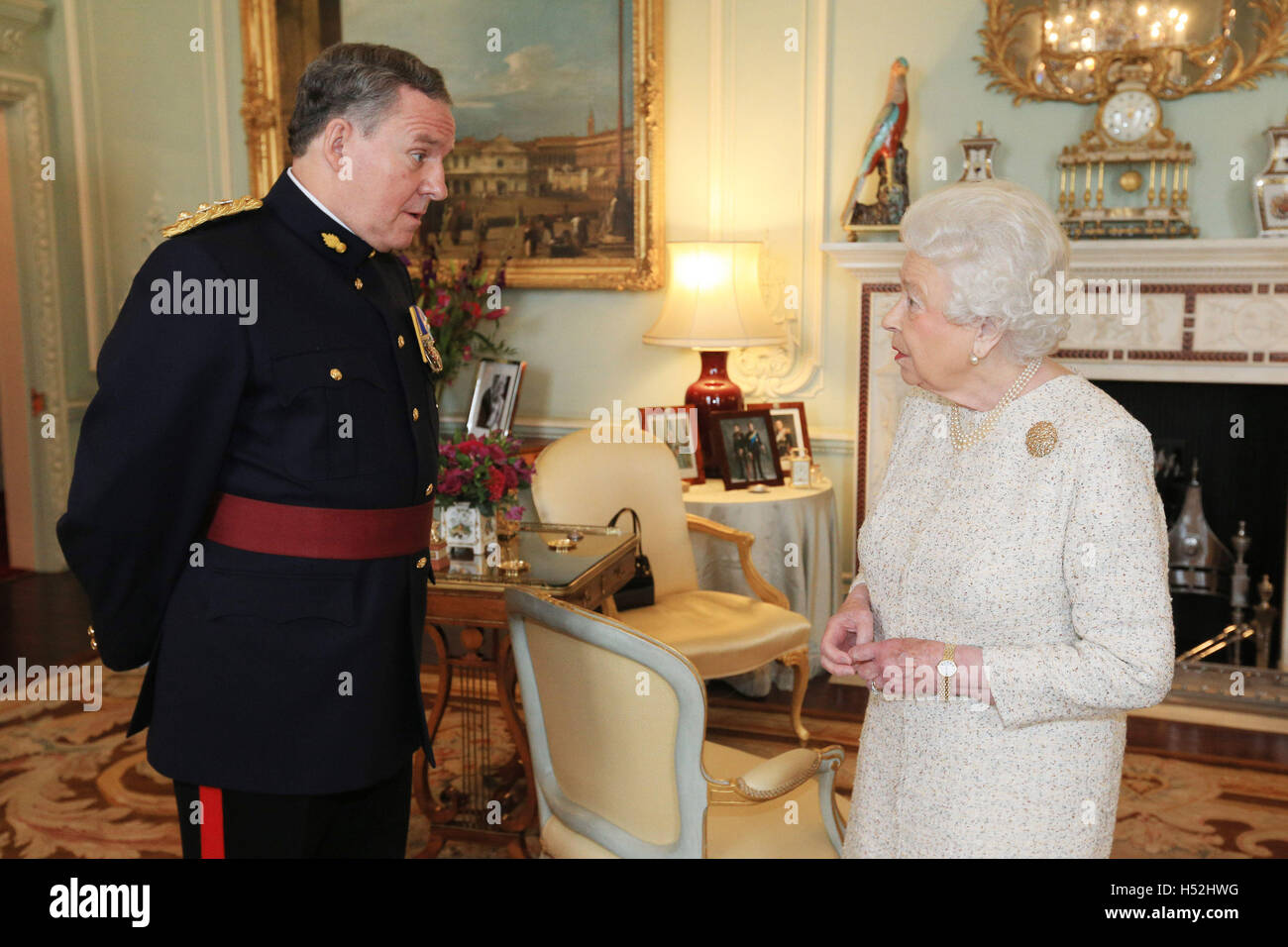 Queen Elizabeth II, as Captain General, Royal Regiment of Canadian Artillery, receives Brigadier ...