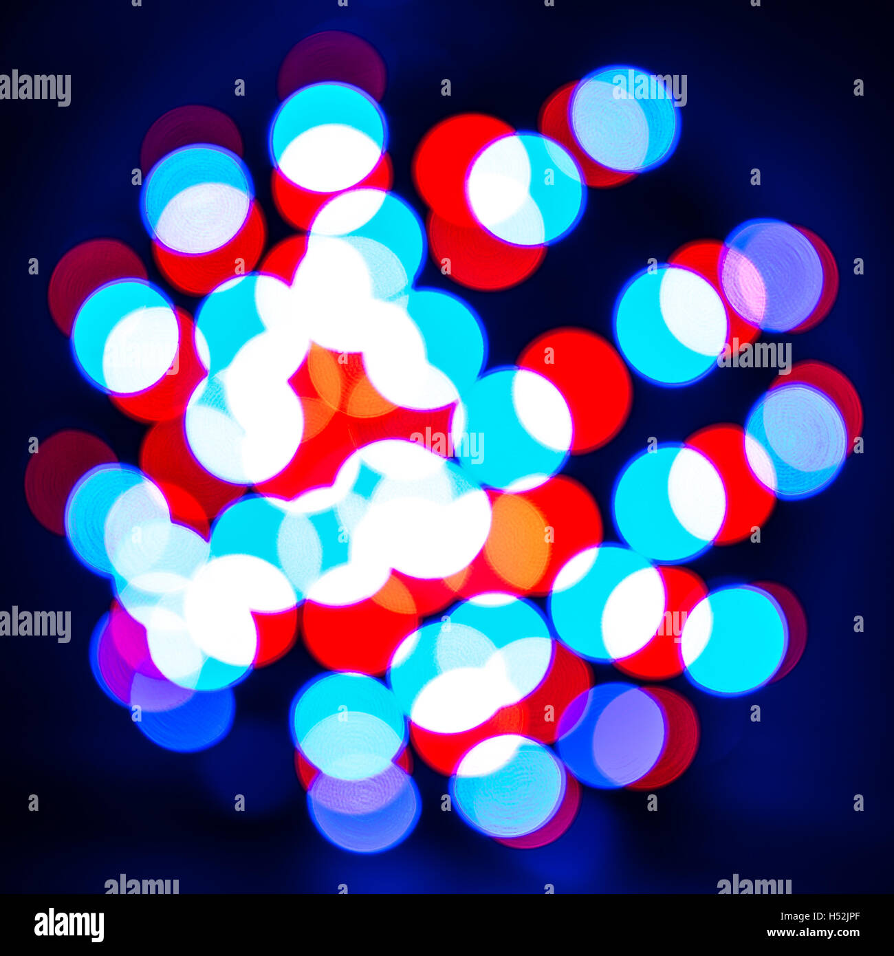 Glowing abstract light spots on dark Stock Photo - Alamy