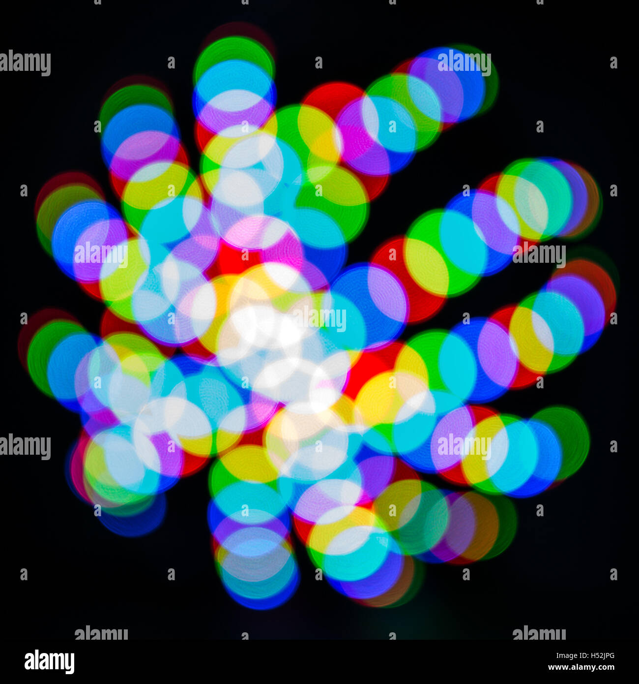 Glowing abstract light spots on dark Stock Photo - Alamy