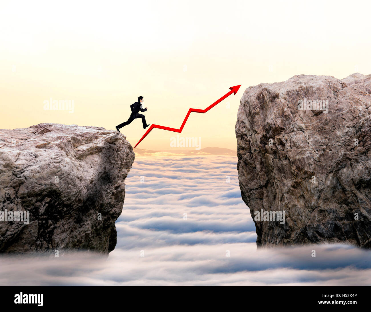 businessman jump across challenge with increasing graph Stock Photo - Alamy