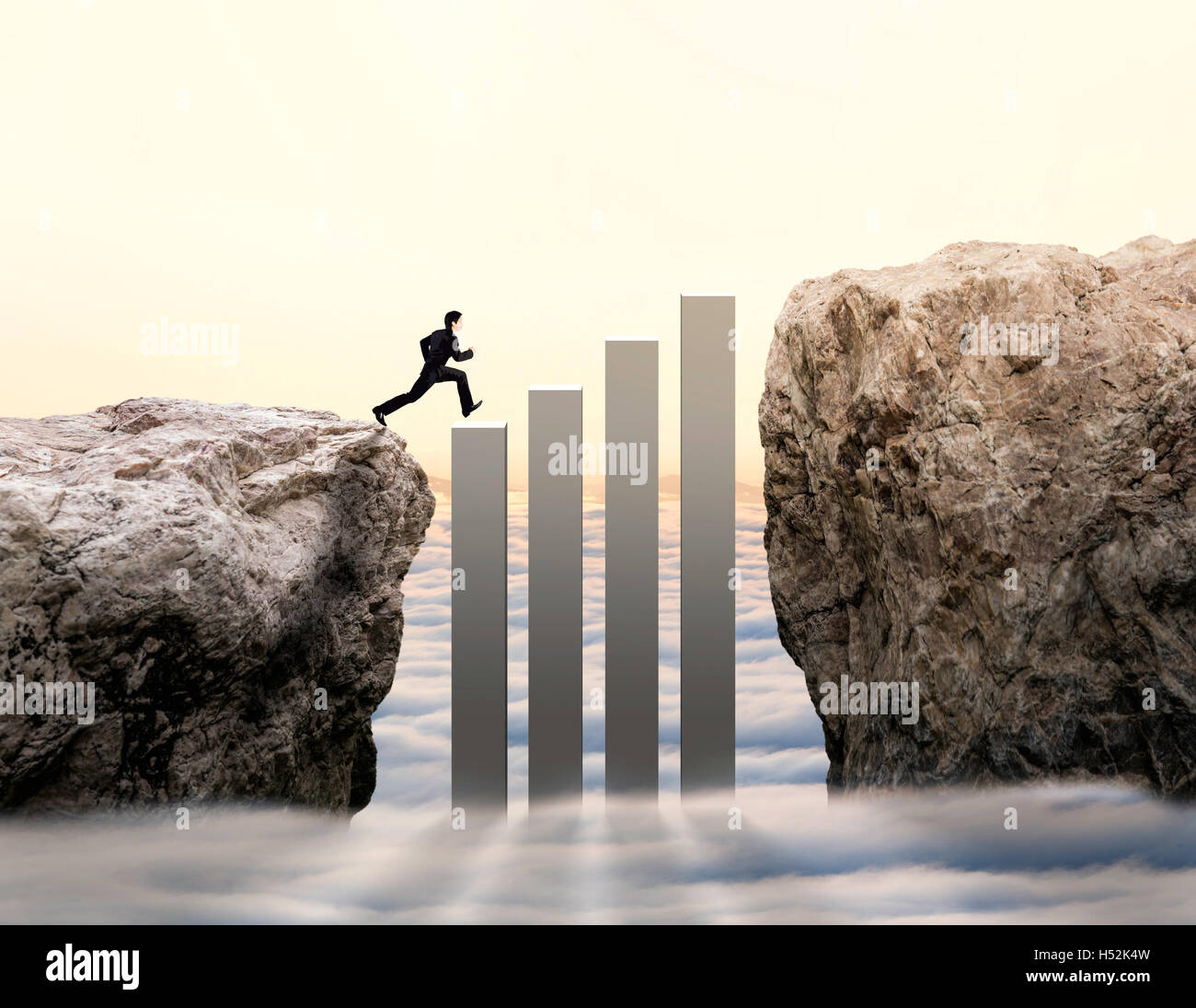 businessman jump across challenge with increasing graph Stock Photo - Alamy