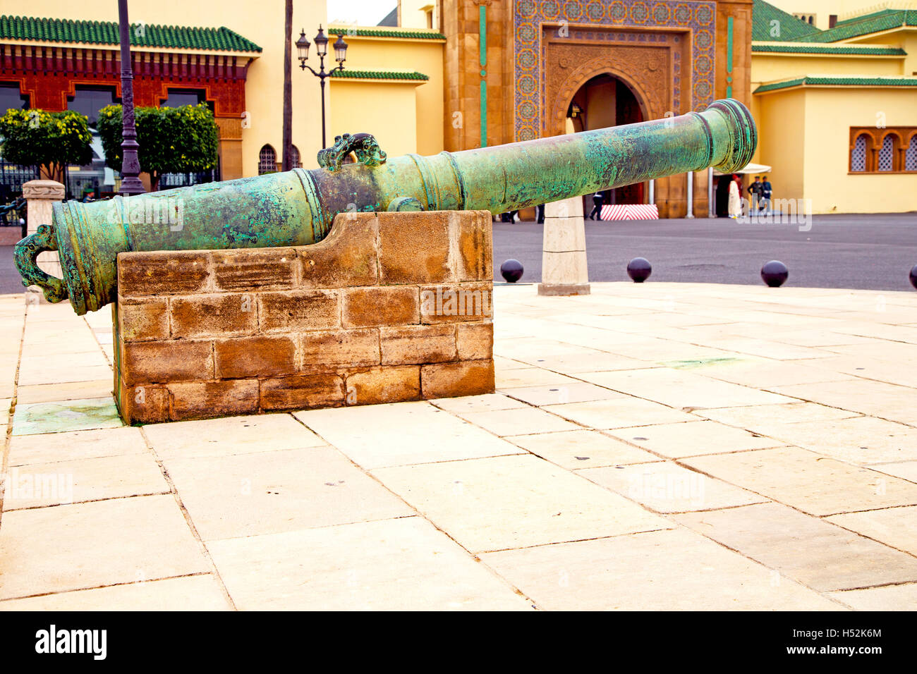 bronze cannon in africa morocco green and the old pavement Stock Photo ...